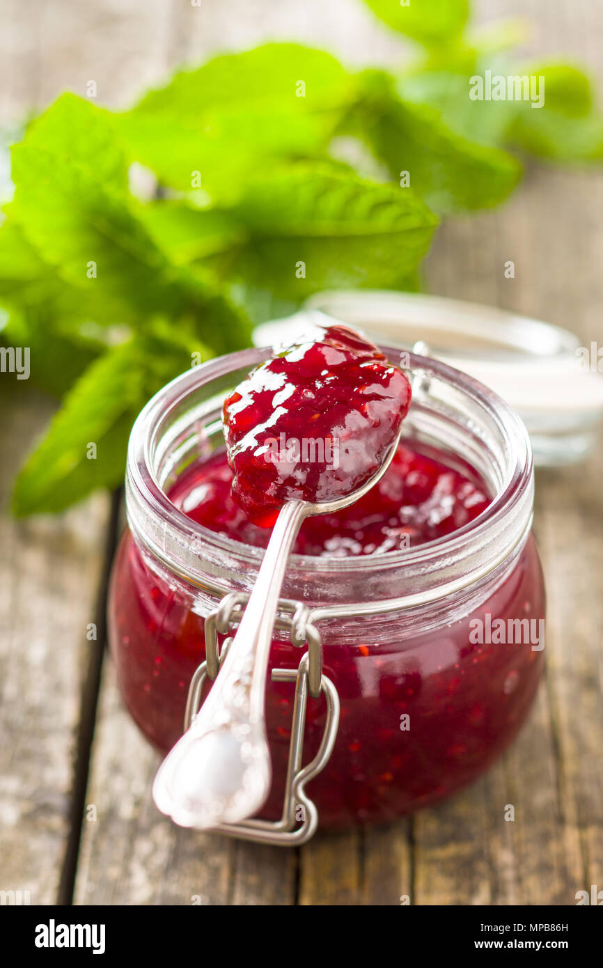 Raspberry jam jelly in jar Stock Photo - Alamy
