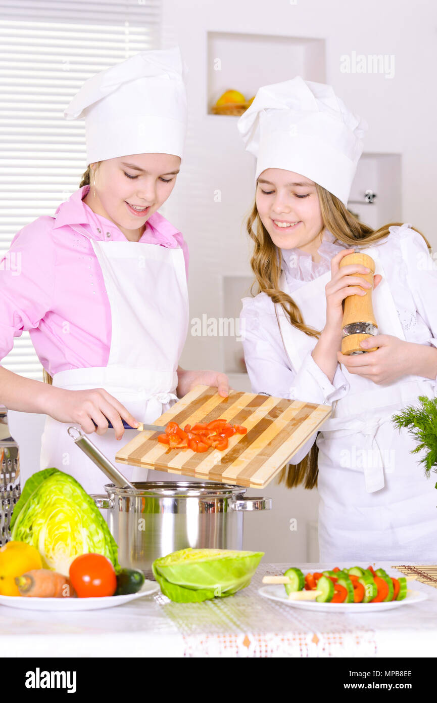 Two chefs cute children hi-res stock photography and images - Alamy