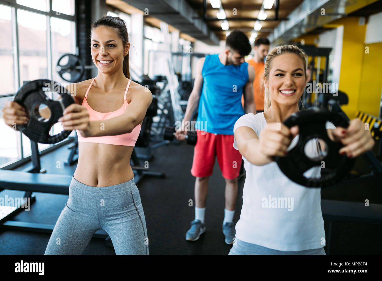 Group of people have workout in gym Stock Photo - Alamy