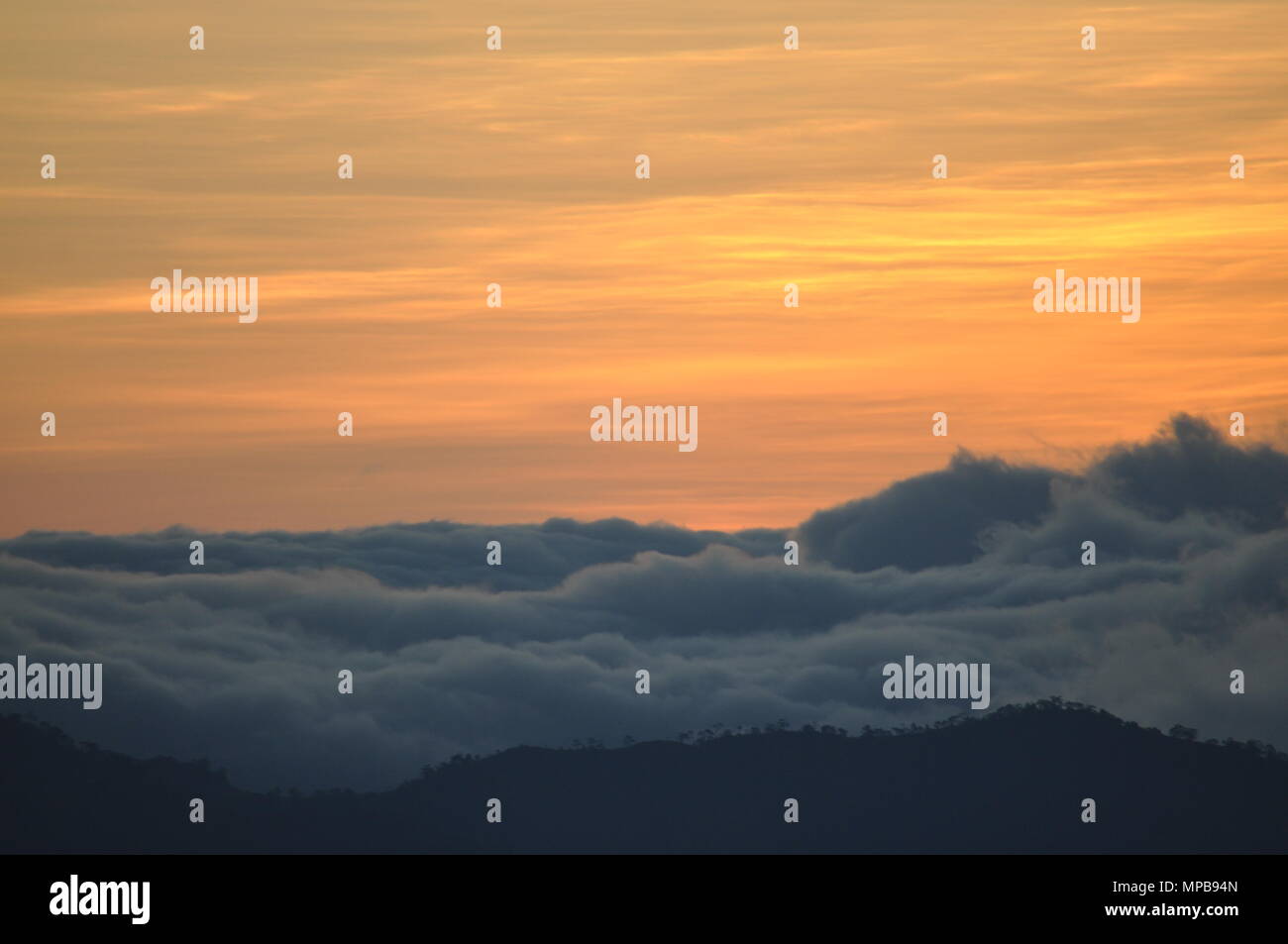 Sunrise at dawn, on a cold Sunday morning in freezing temperatures, the ...