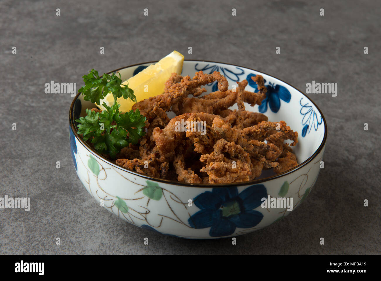 Ika Geso japanese fried spicy squid tentacle Stock Photo - Alamy