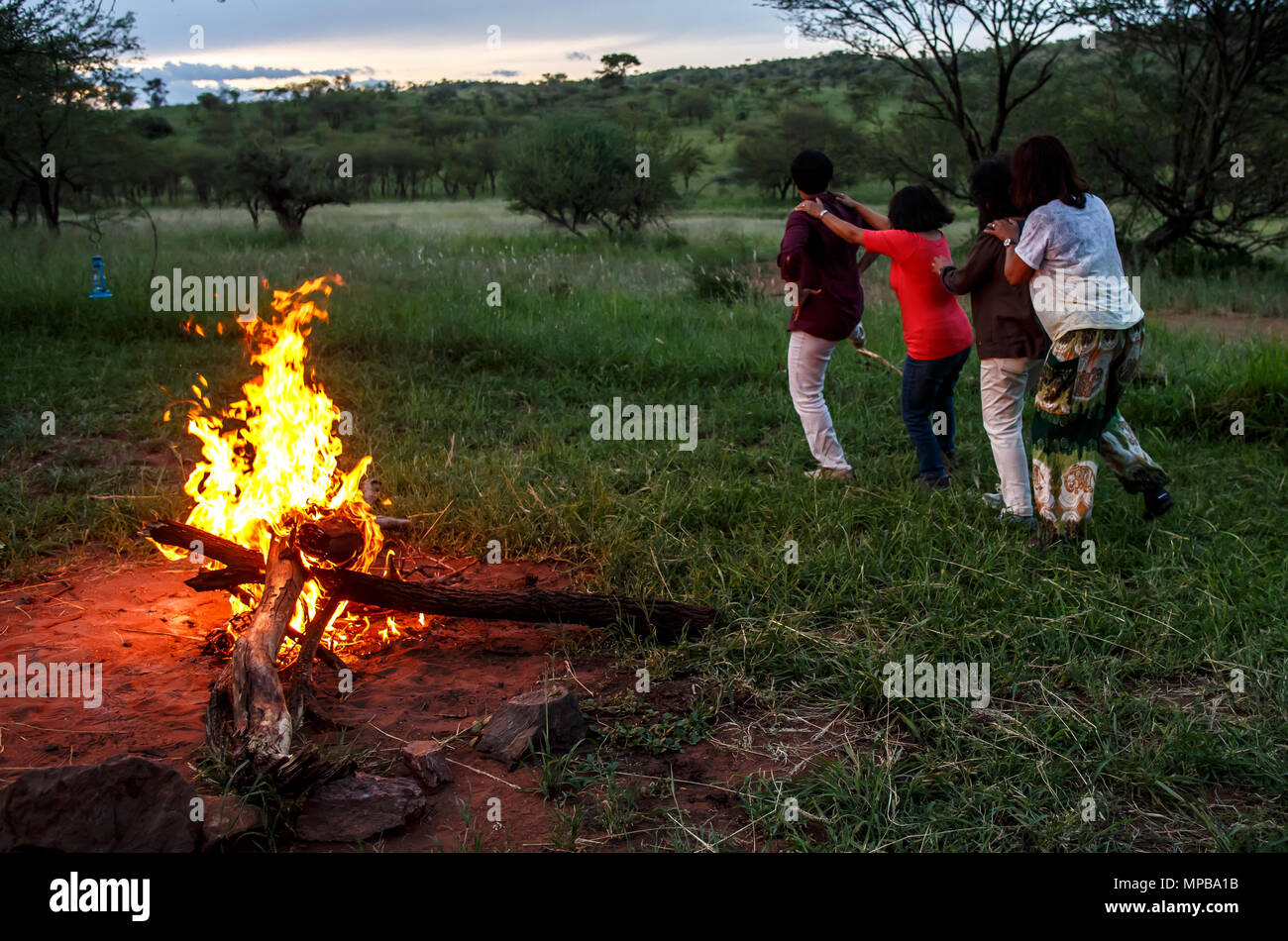 A bush camp fire in Africa Stock Photo - Alamy