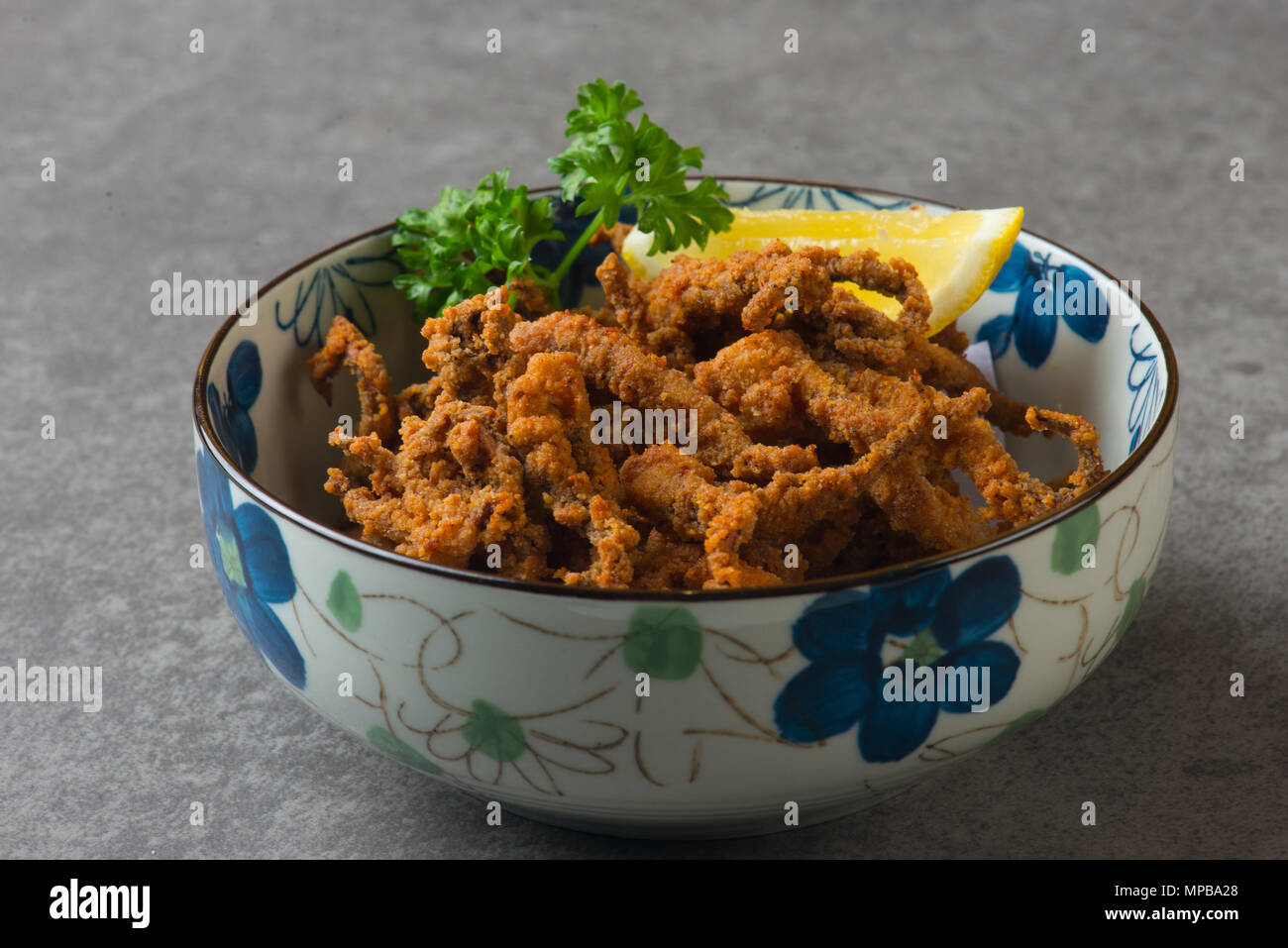 Ika Geso japanese fried spicy squid tentacle Stock Photo - Alamy