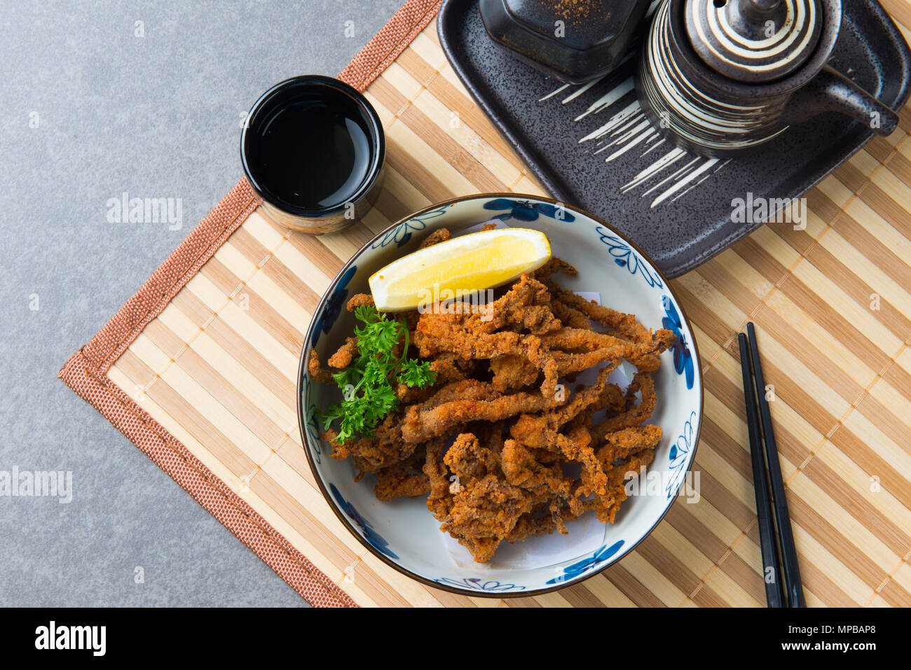 Ika Geso japanese fried spicy squid tentacle flat lay Stock Photo - Alamy