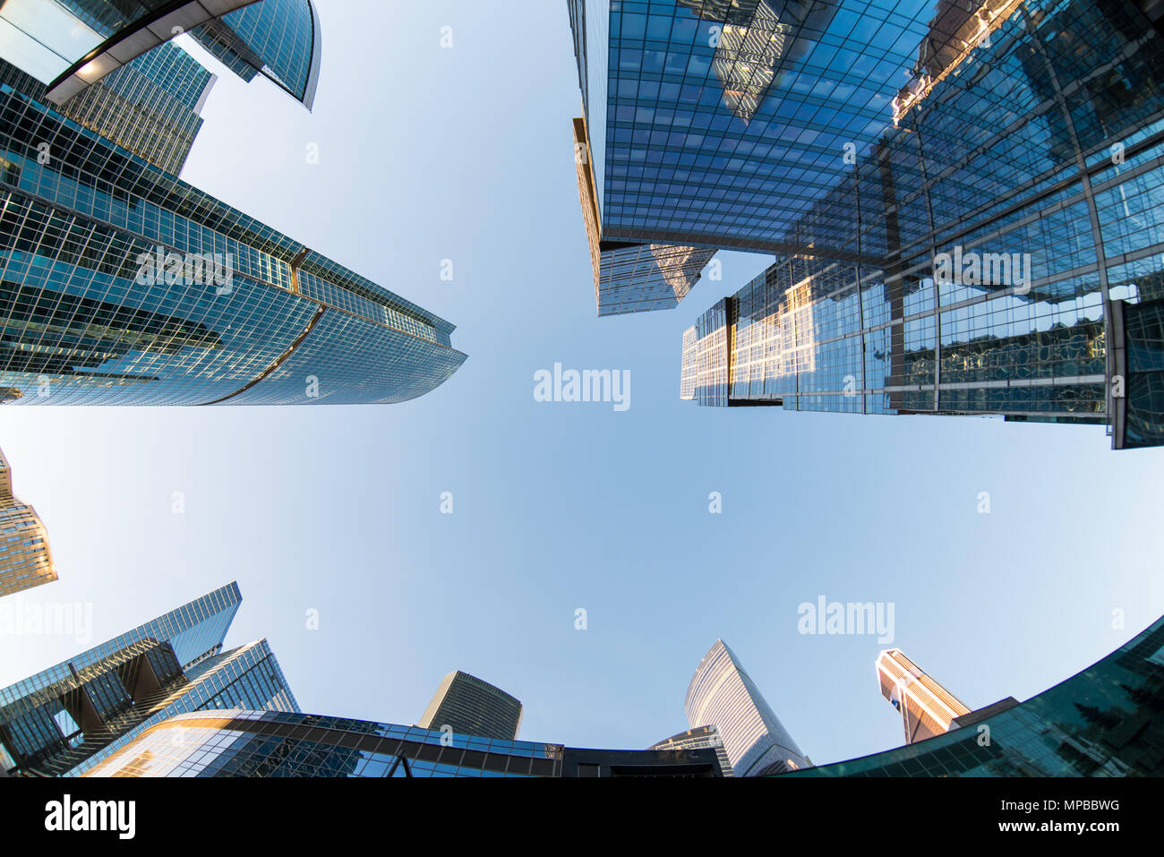 Perspective low angle view of modern glass skyscrapers facades Stock ...