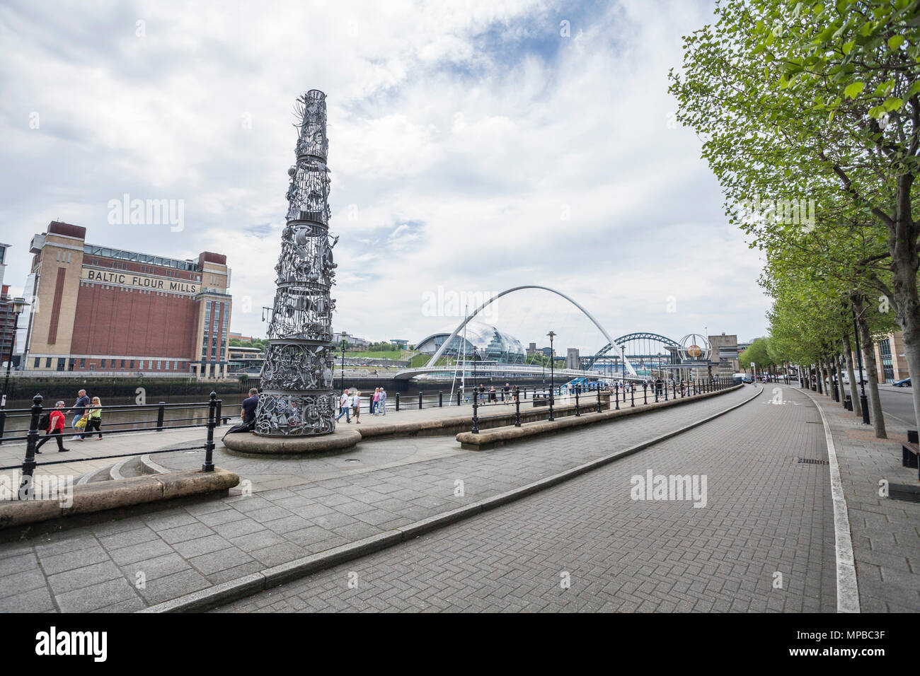 A view of the Newcastle Quayside featuring the Blacksmiths Needle and ...