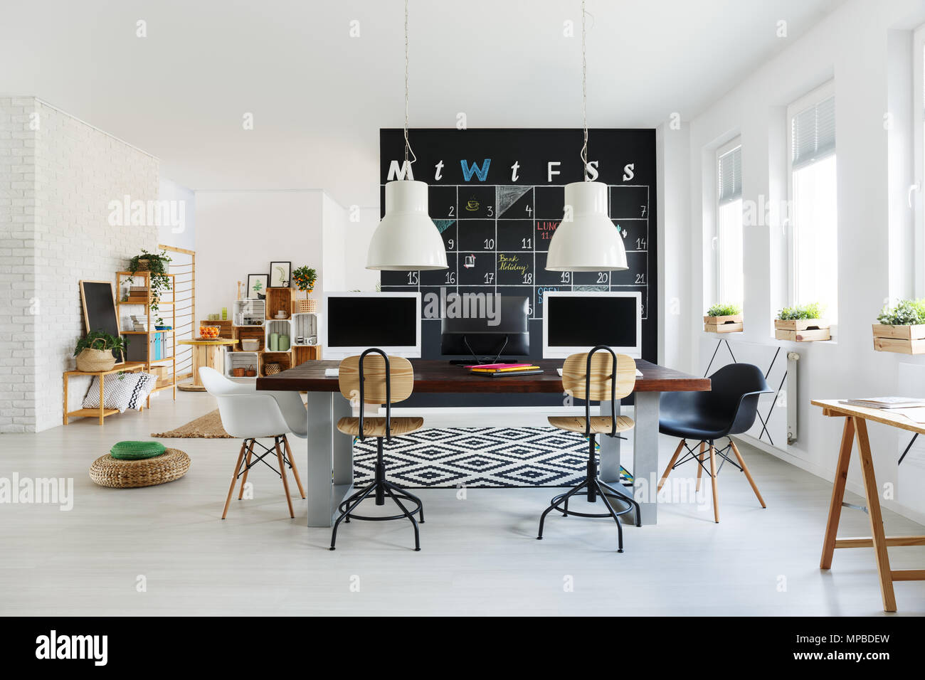 White interior with simple office desk and wood chairs Stock Photo - Alamy