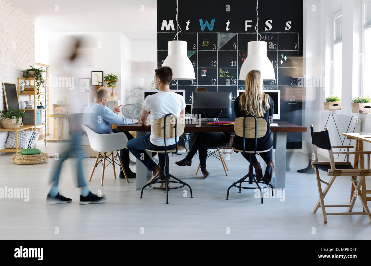 People working in modern, creative work environment Stock Photo - Alamy