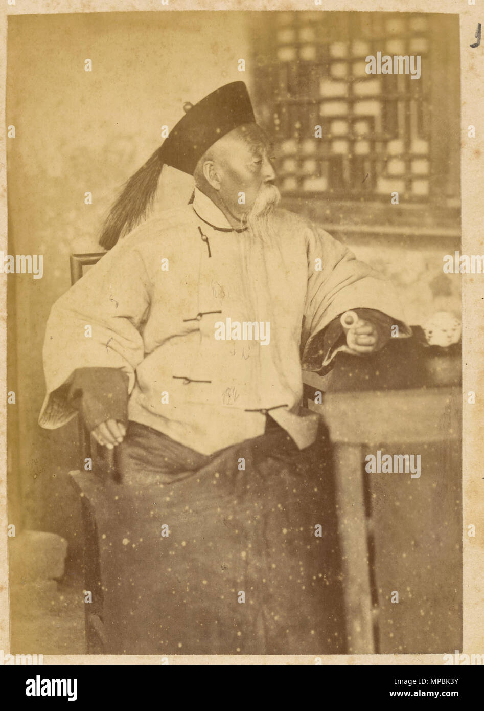 940 Old Manchu Gentleman in Padded Silk Jacket and Gown with a Jade ...
