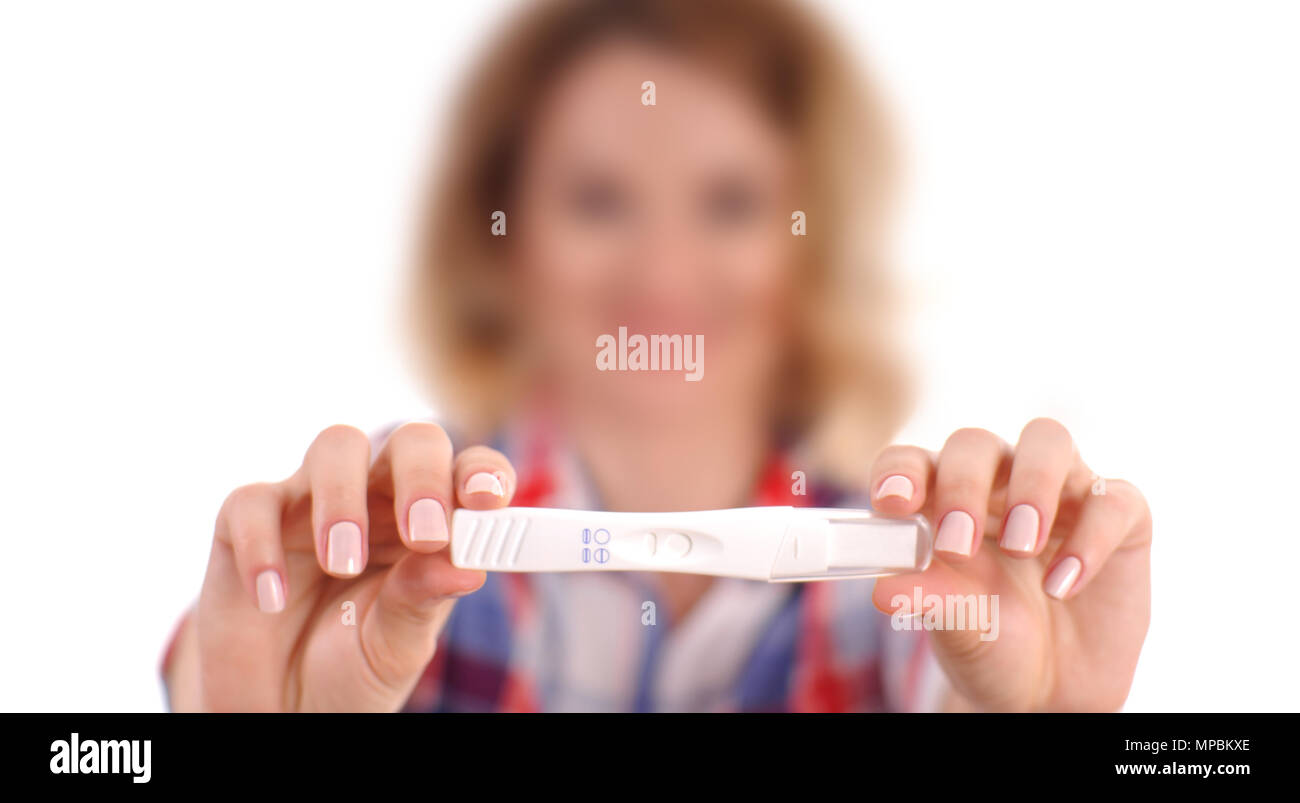 Pregnant test. Happy woman showing a positive pregnancy test Stock ...