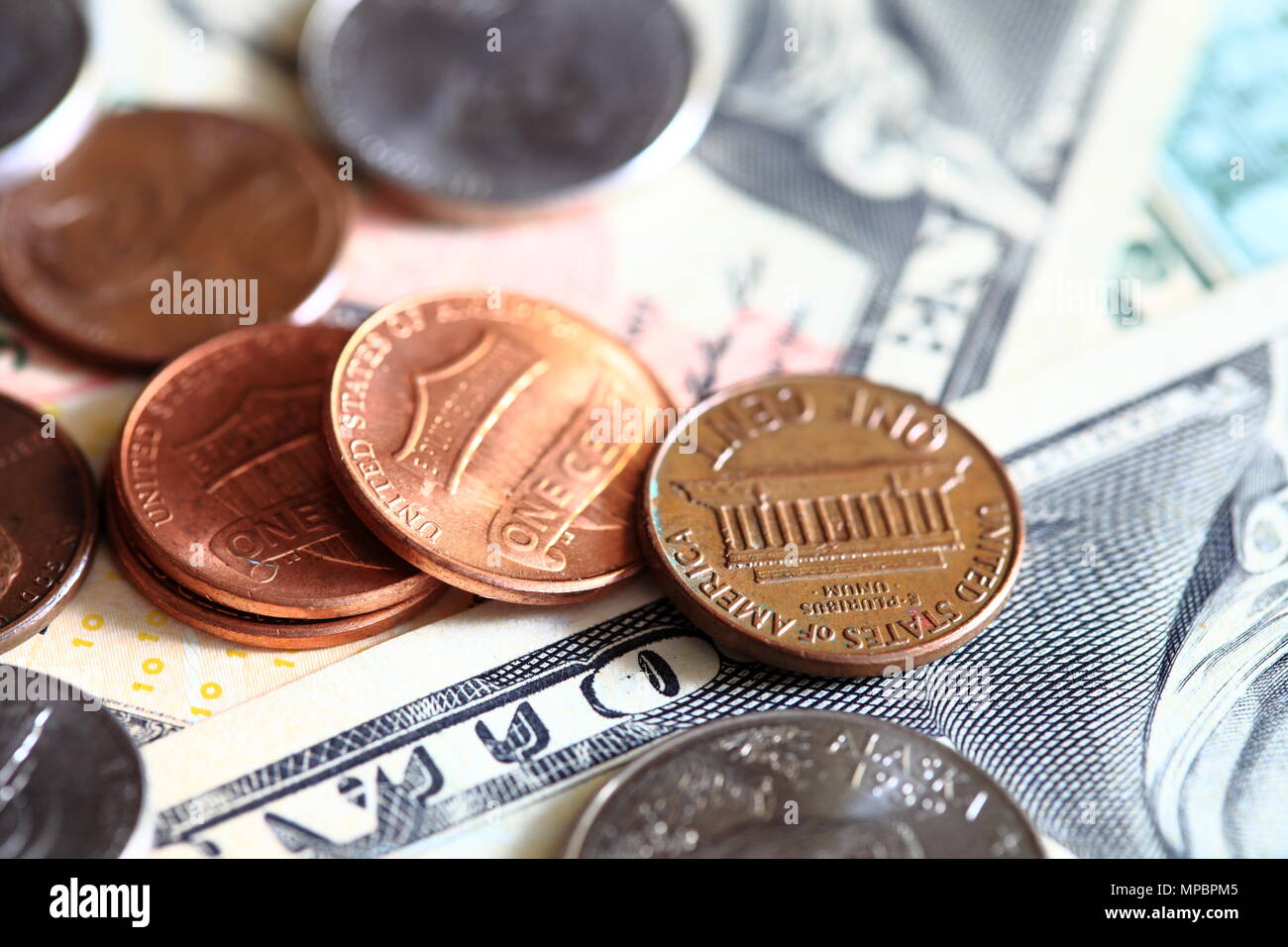 US dollar bills and cent coins close up Stock Photo - Alamy