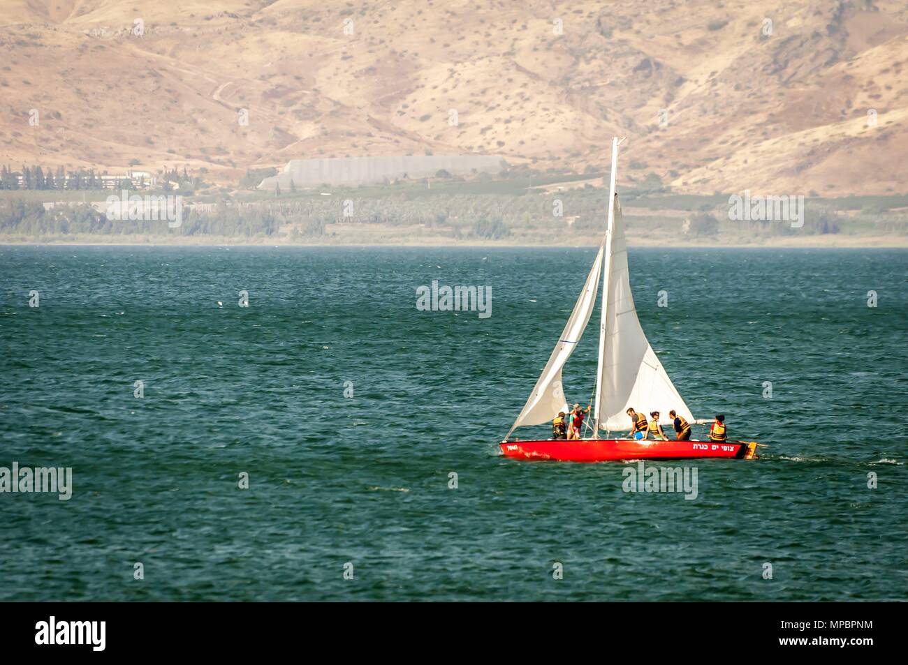 LAKE KINNERET, ISRAEL. May 12, 2018. Young teenage sea scouts learning ...
