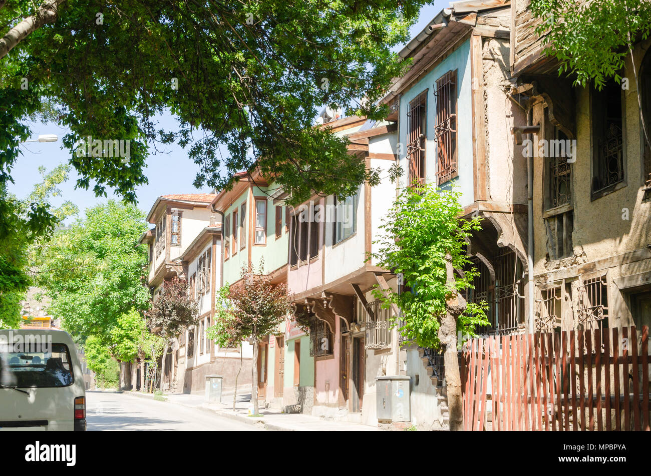 Beautiful old street in downtown with houses with wooden shutters in ...