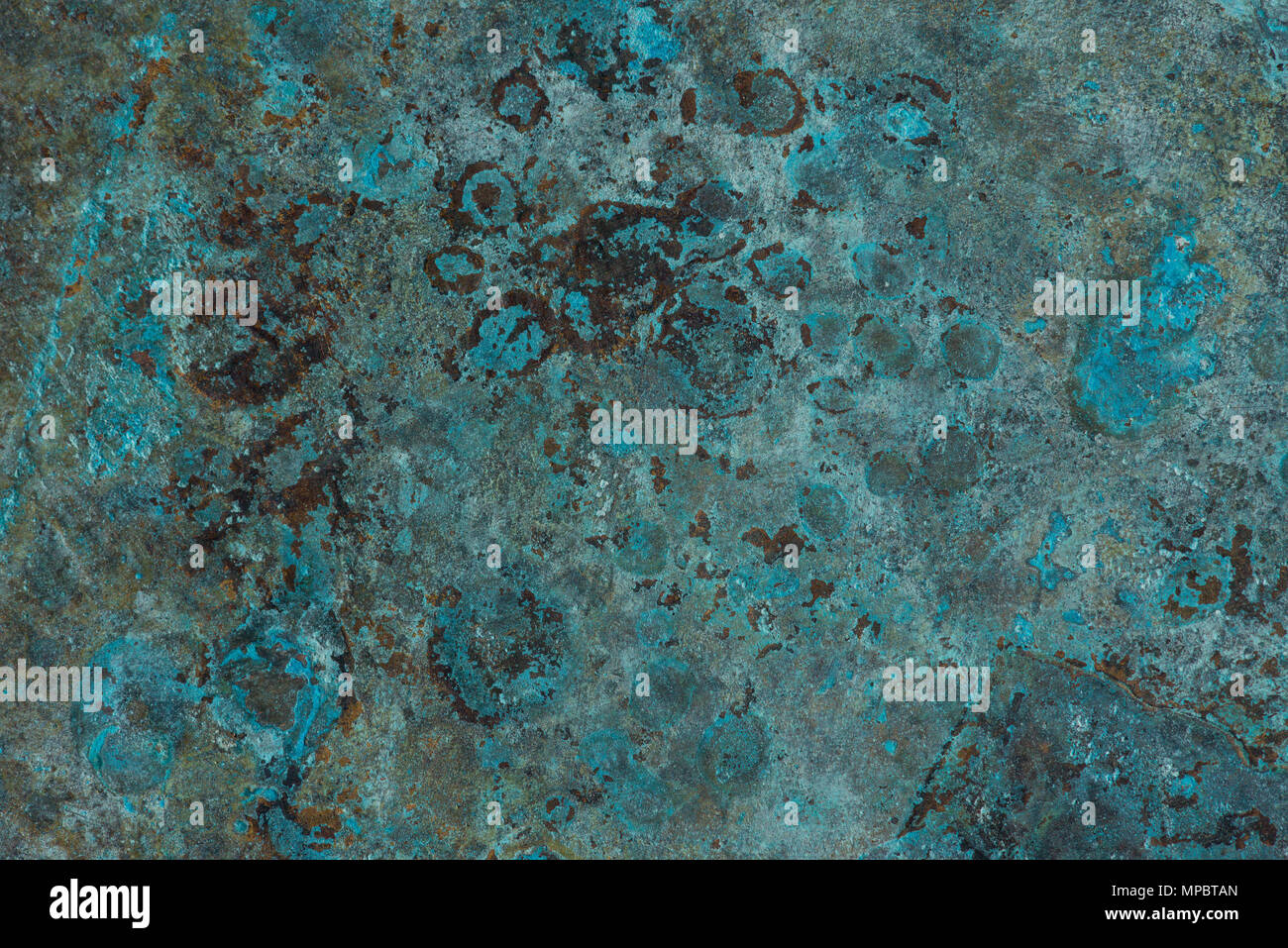 Old bronzed brass metal coated with patina and random patterns from ...