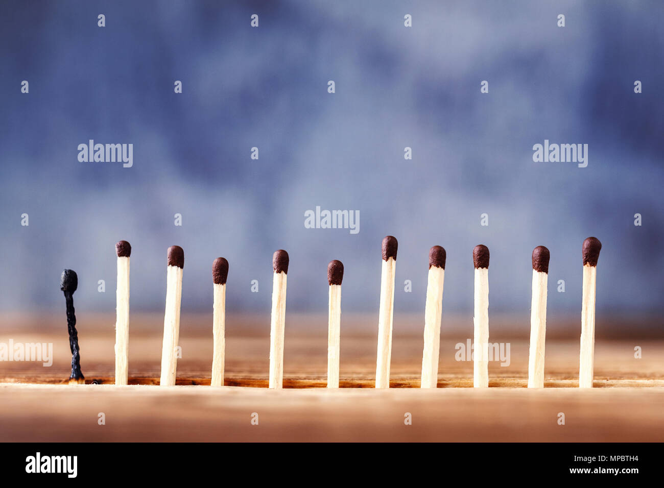 Burnt matchsticks in black background hi-res stock photography and ...