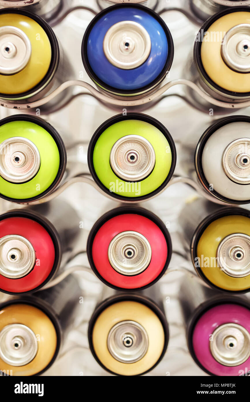 rows of colored paint cans in the store Stock Photo - Alamy