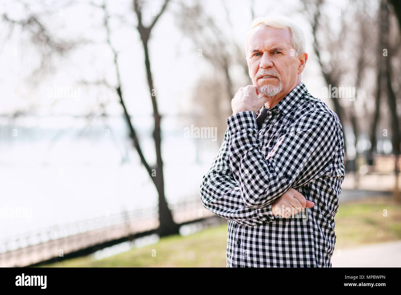Pensive senior man facing trouble Stock Photo - Alamy