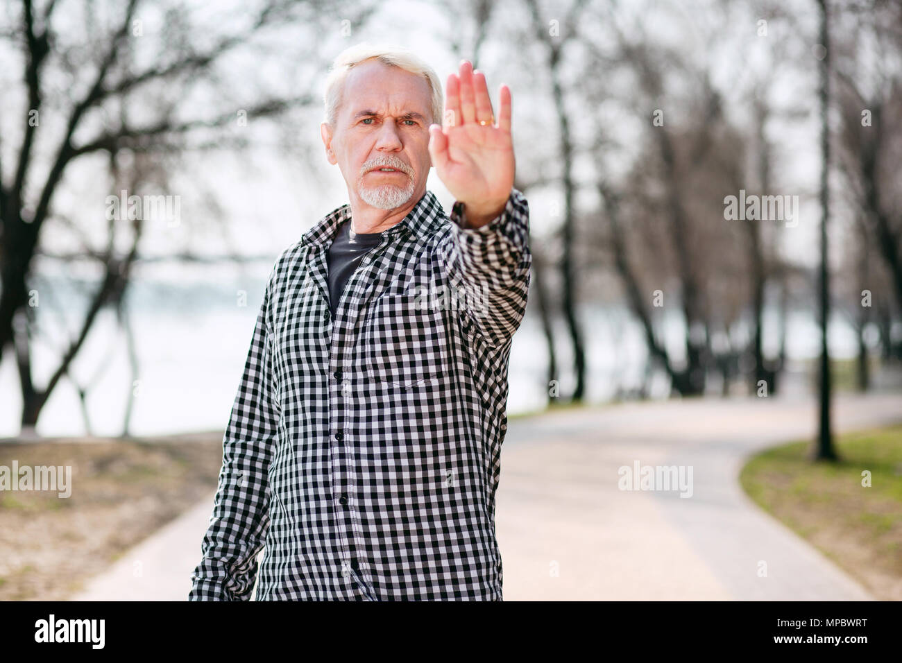 Hands stopping man hi-res stock photography and images - Alamy