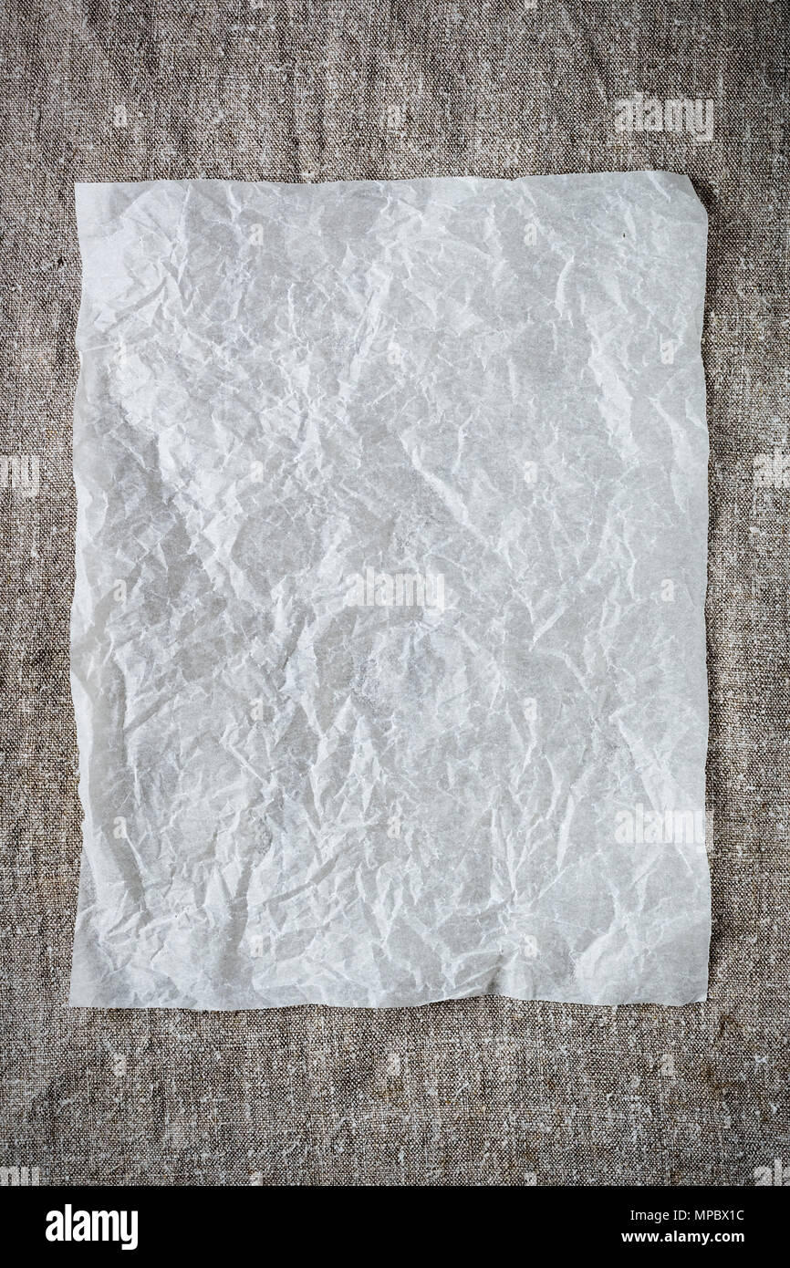 crumpled sheet of paper on a gray background. Place for entries. Layout ...