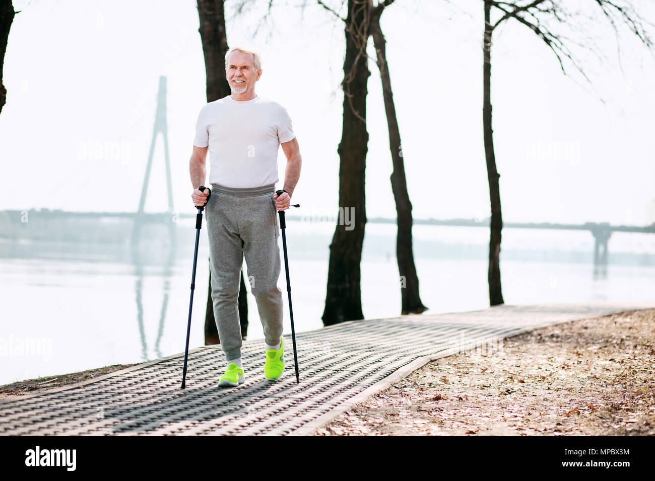 Fit elderly man walking hi-res stock photography and images - Alamy