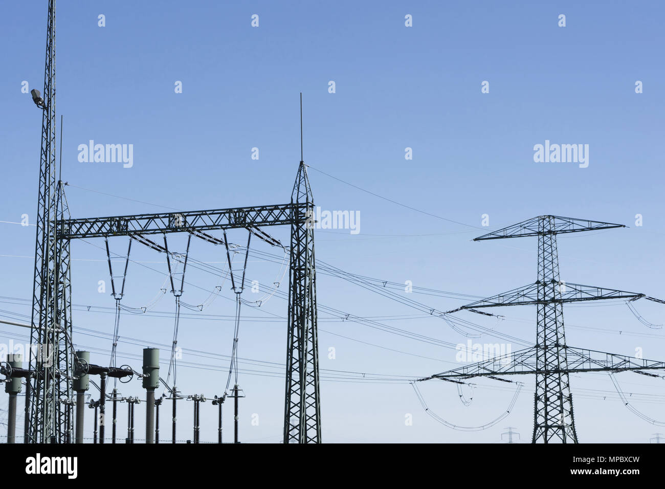 electrical substation on blue sky background Stock Photo - Alamy