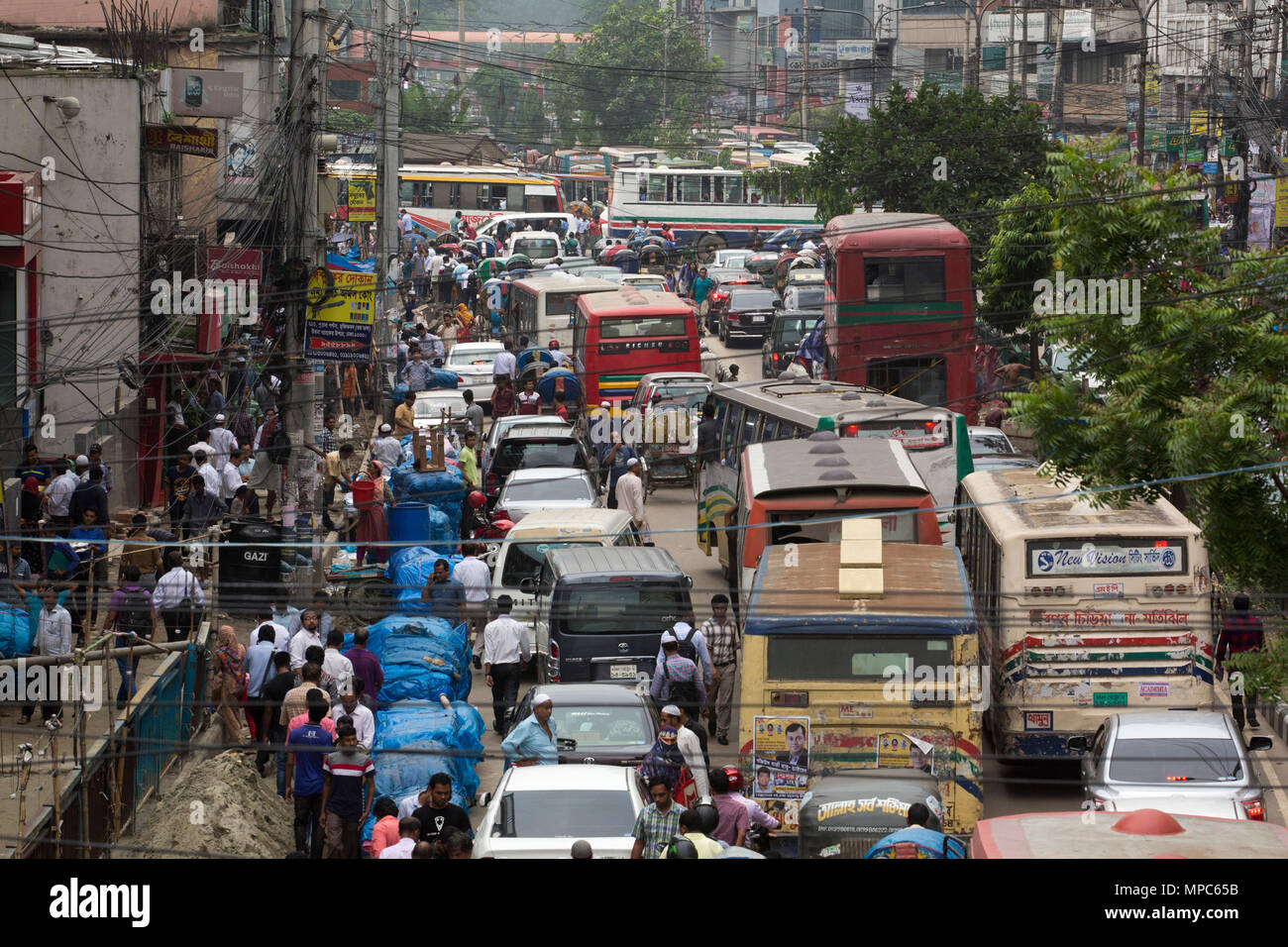 DHAKA, BANGLADESH - MAY 22 : People stuck in traffic jam in Dhaka ...