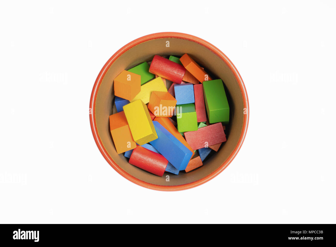 Colorful wooded toy blocks in bucket isolated on white background. Top ...