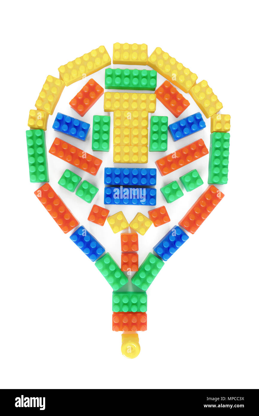 Light bulb shape with colorful plastic brick toys isolated on white ...