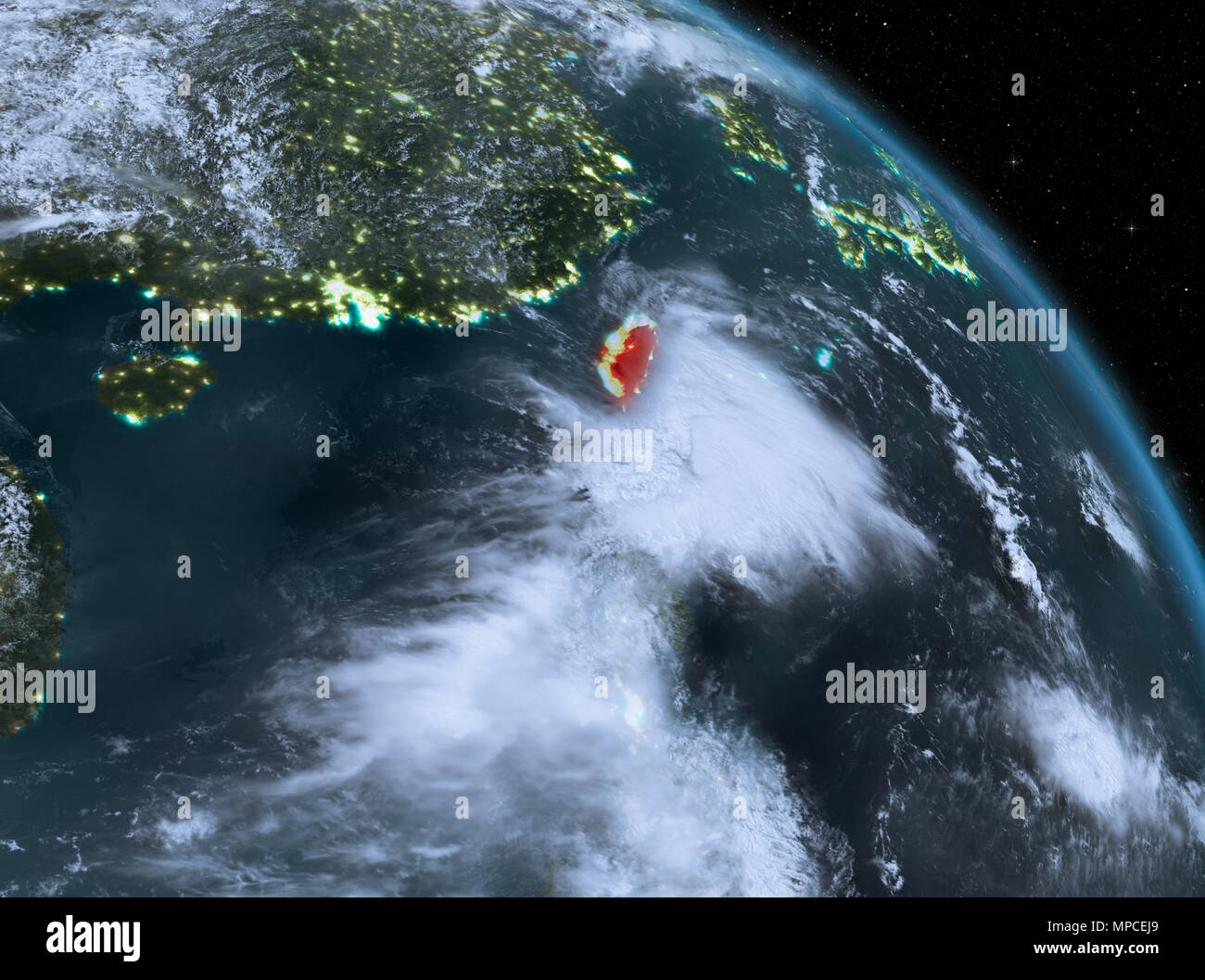 Night above Taiwan highlighted in red on model of planet Earth in space ...