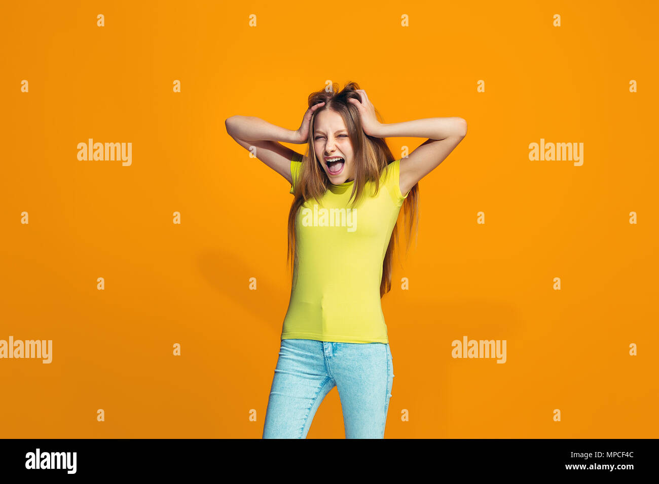 The squint eyed teen girl with weird expression Stock Photo - Alamy