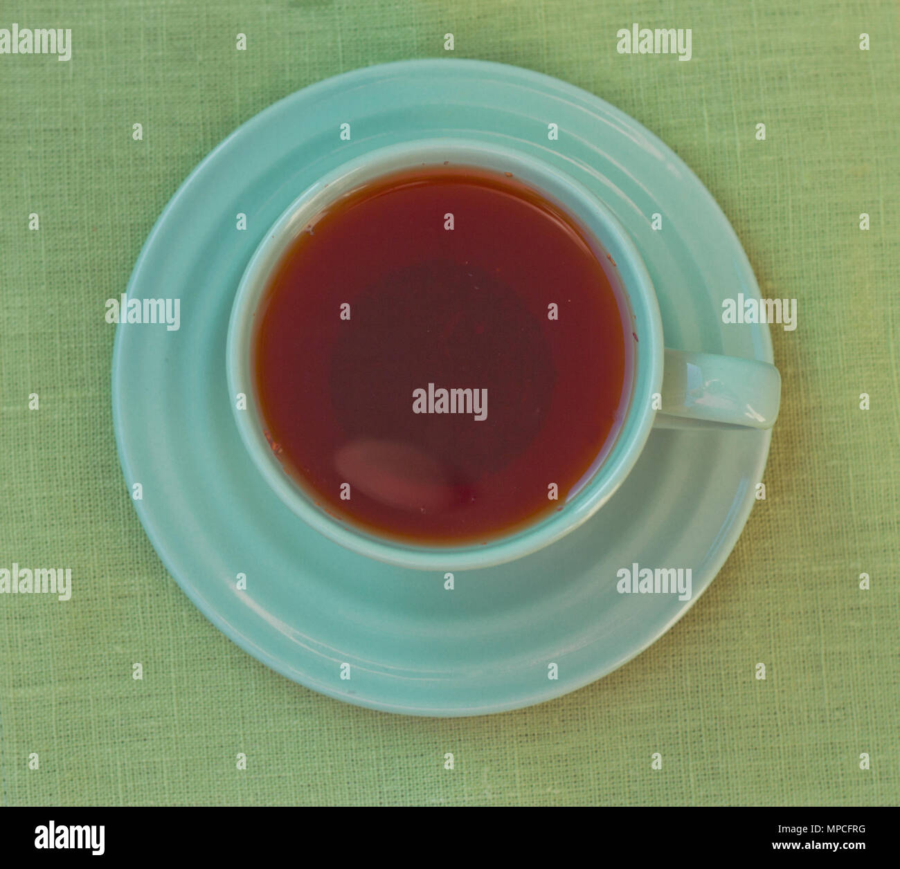 Green cup of tea. View from above. toning Stock Photo - Alamy