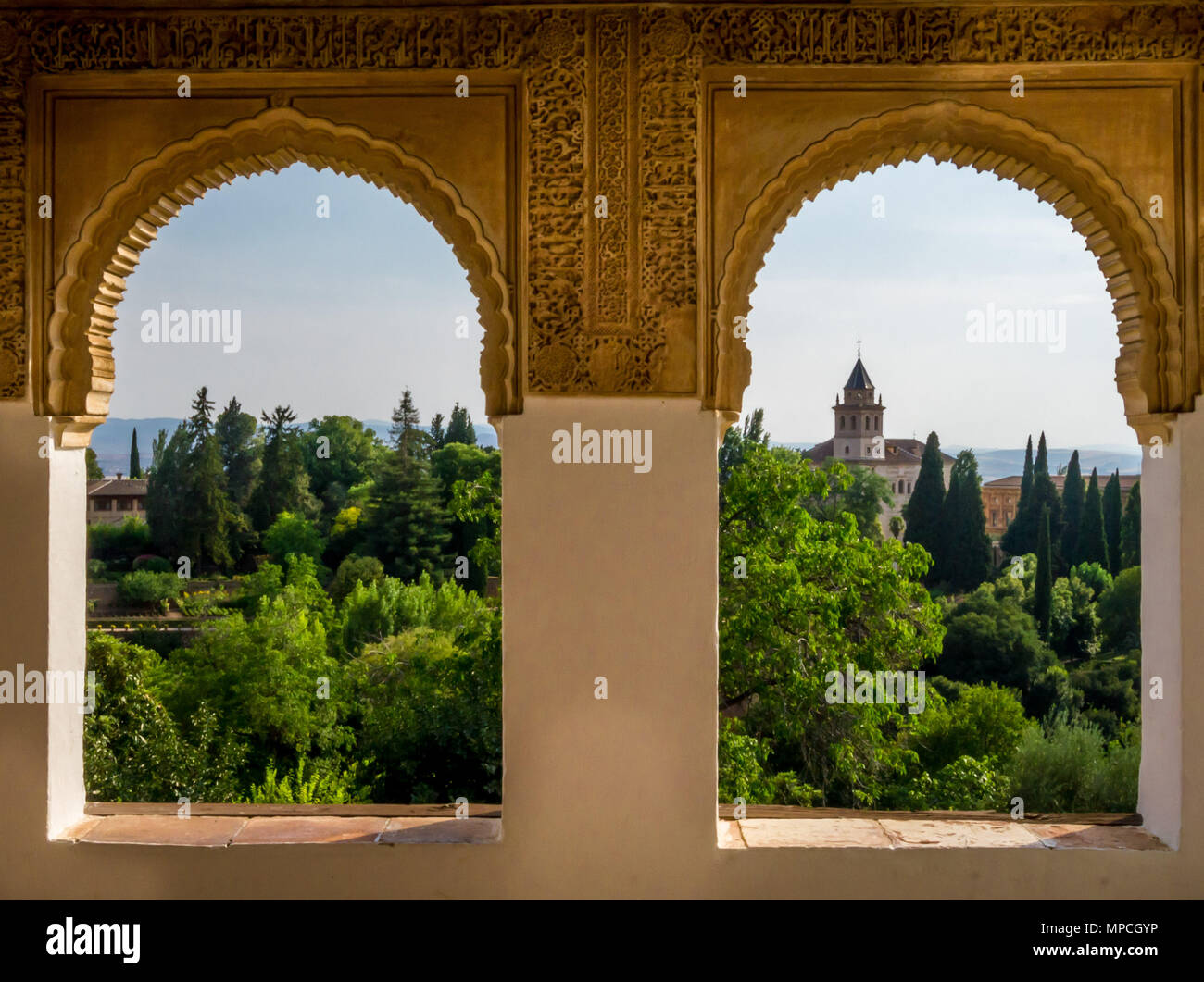 Symmetrical windows in the Alhambra of Granada in Spain Stock Photo - Alamy
