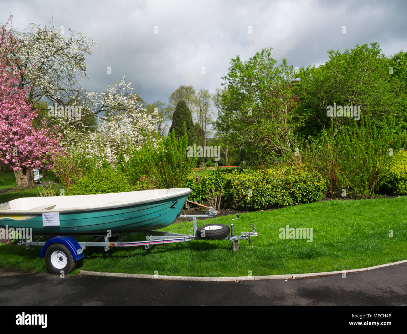 Moored boat St Nicholas' Park with colourful formal gardens and ...