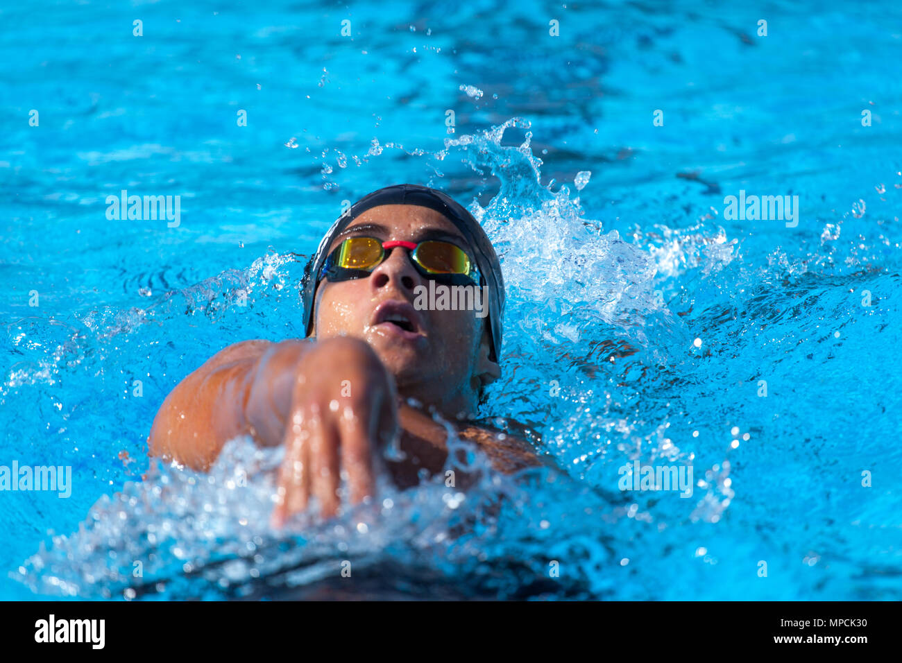 Backwards Swimming kids in the pool Stock Photo - Alamy