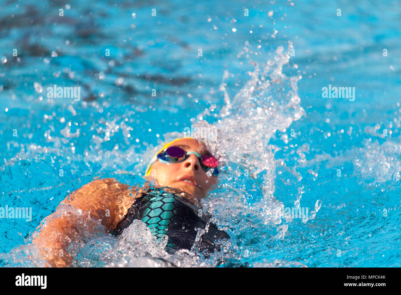 Backwards Swimming kids in the pool Stock Photo - Alamy