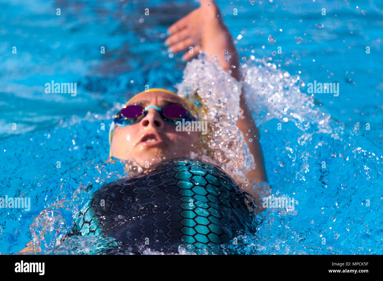 Backwards Swimming kids in the pool Stock Photo - Alamy
