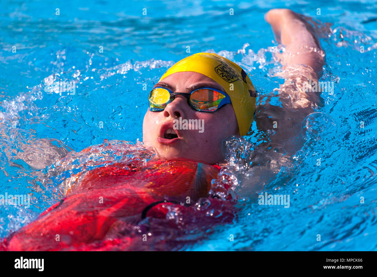 Backwards Swimming kids in the pool Stock Photo - Alamy