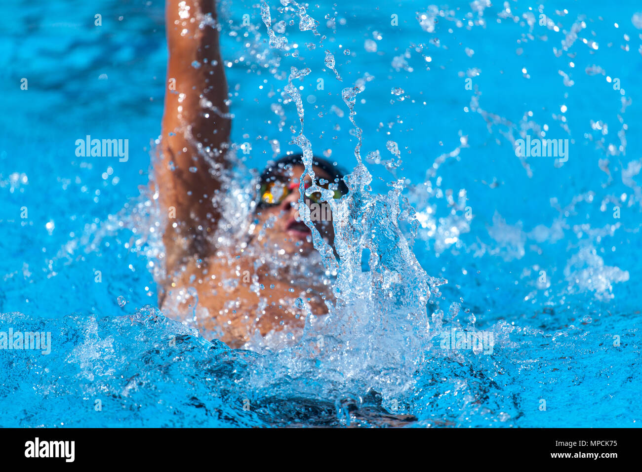 Backwards Swimming kids in the pool Stock Photo - Alamy