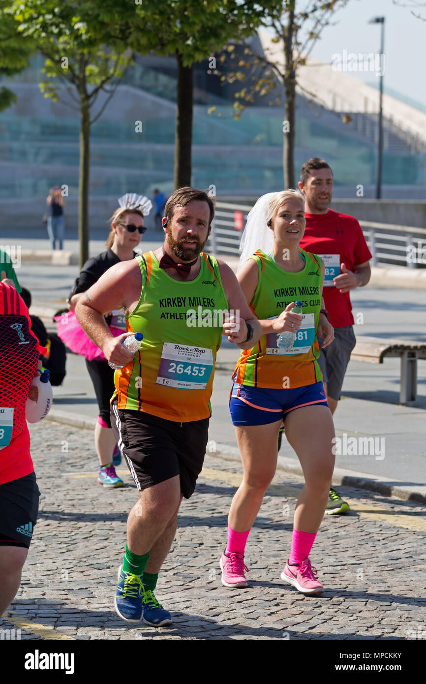 Runners some in fancy dress taking part in the Liverpool Rock n Roll ...