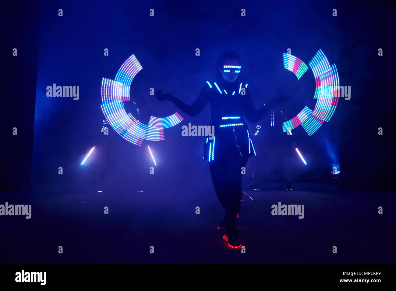 Laser show performance, dancers in led suits with LED lamp, very ...