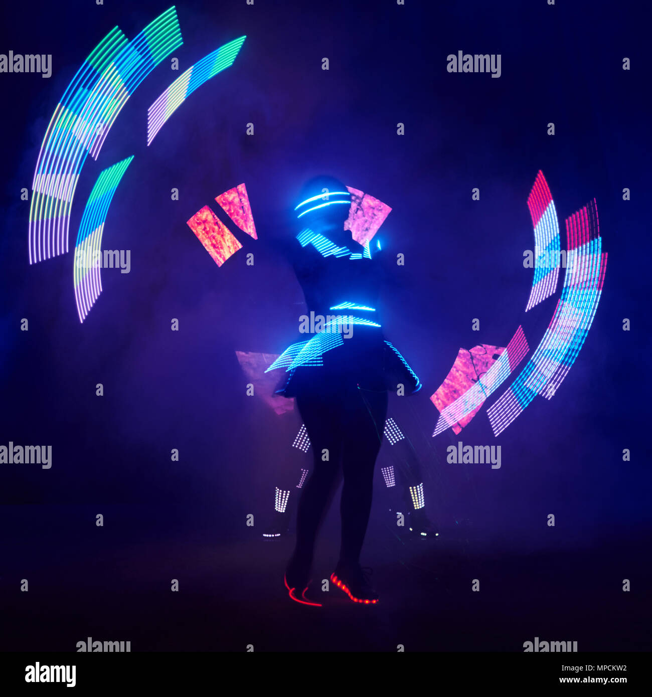 Laser show performance, dancers in led suits with LED lamp, very ...
