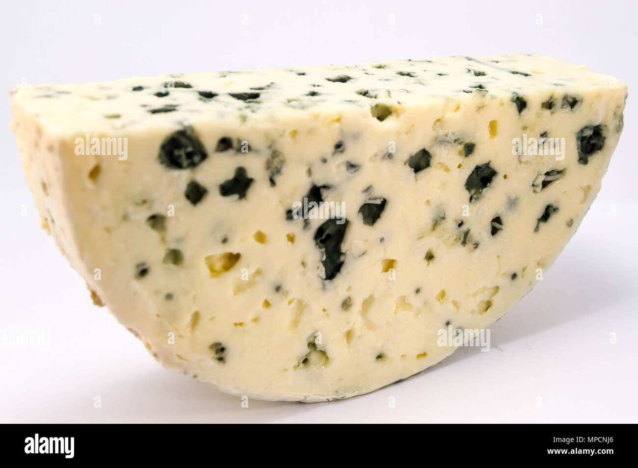 Half moon of Roquefort cheese from France on a white background Stock ...