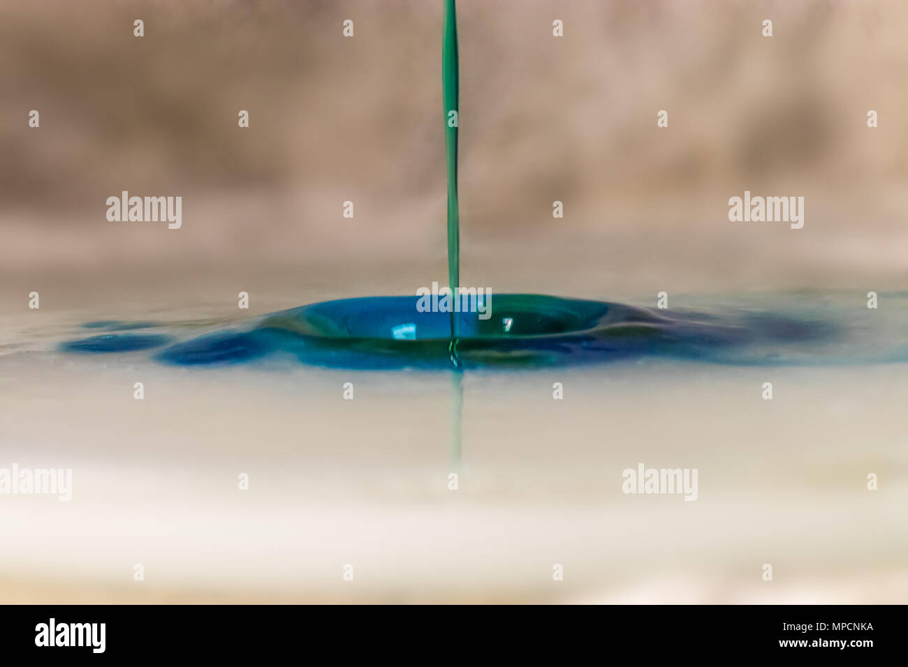 Artistic paint pouring effect hi-res stock photography and images - Alamy