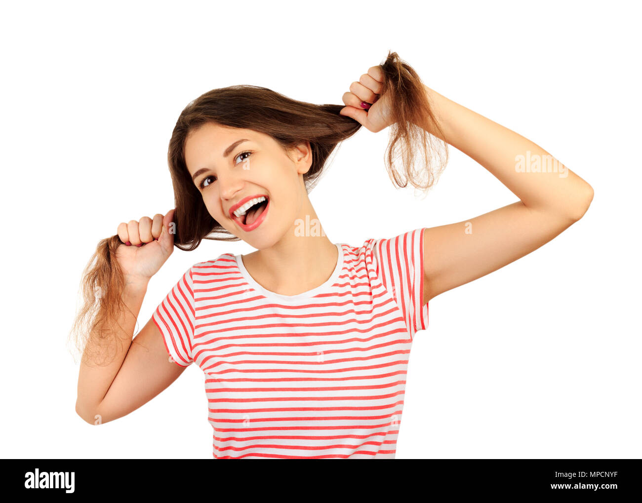 Portrait of crazy young woman playing with her hairs. emotional girl ...