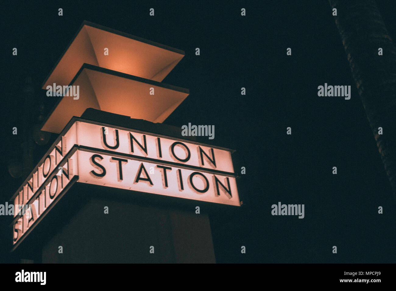 Union Station sign with light at night Stock Photo - Alamy