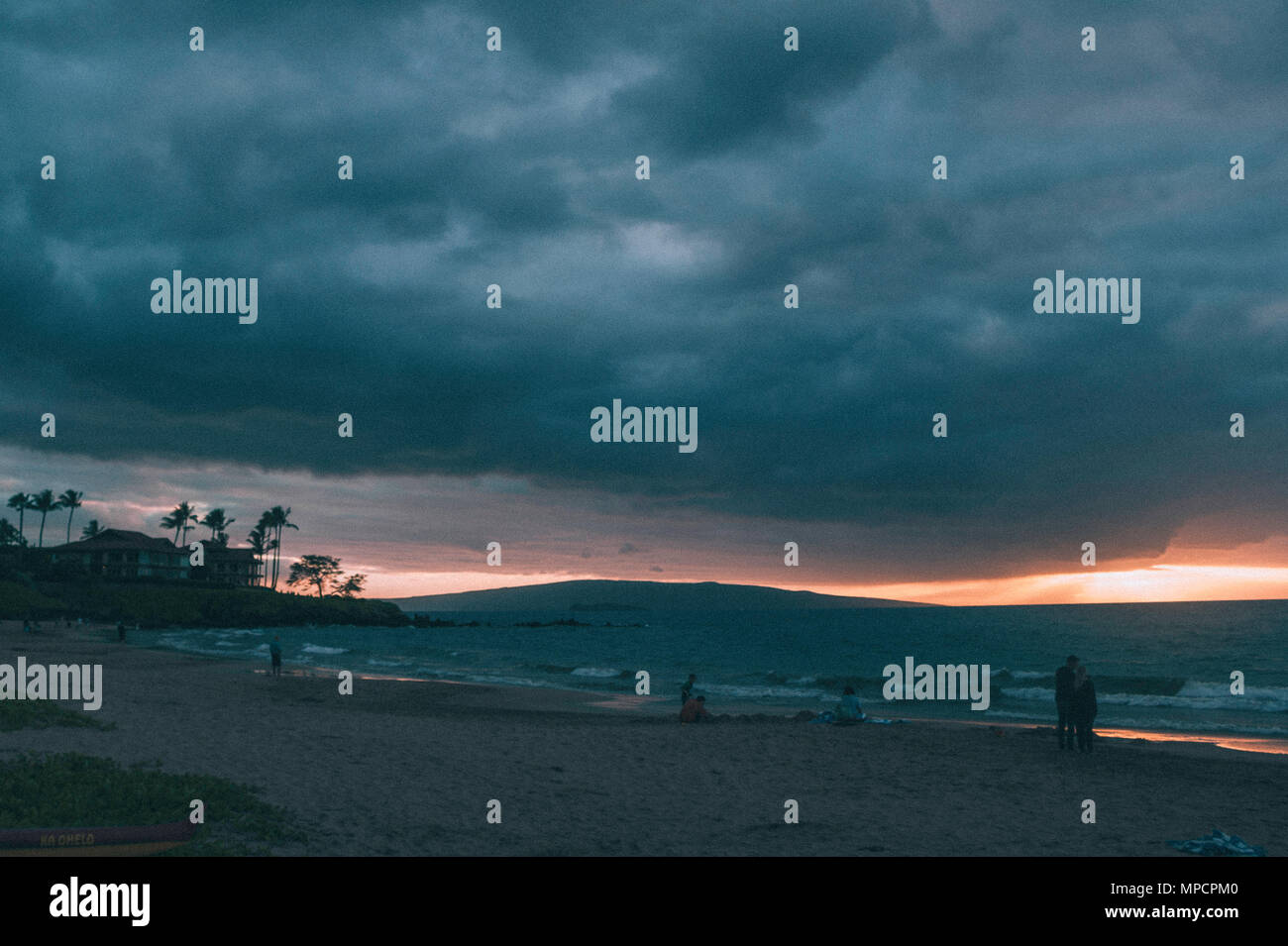Hawaii beach on Maui during sunset at dusk Stock Photo - Alamy