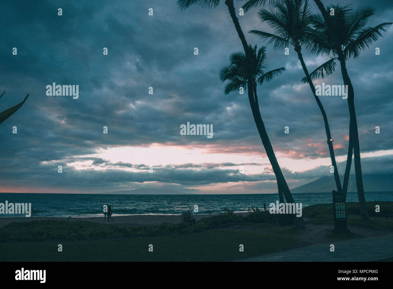 Hawaii beach on Maui during sunset at dusk Stock Photo - Alamy