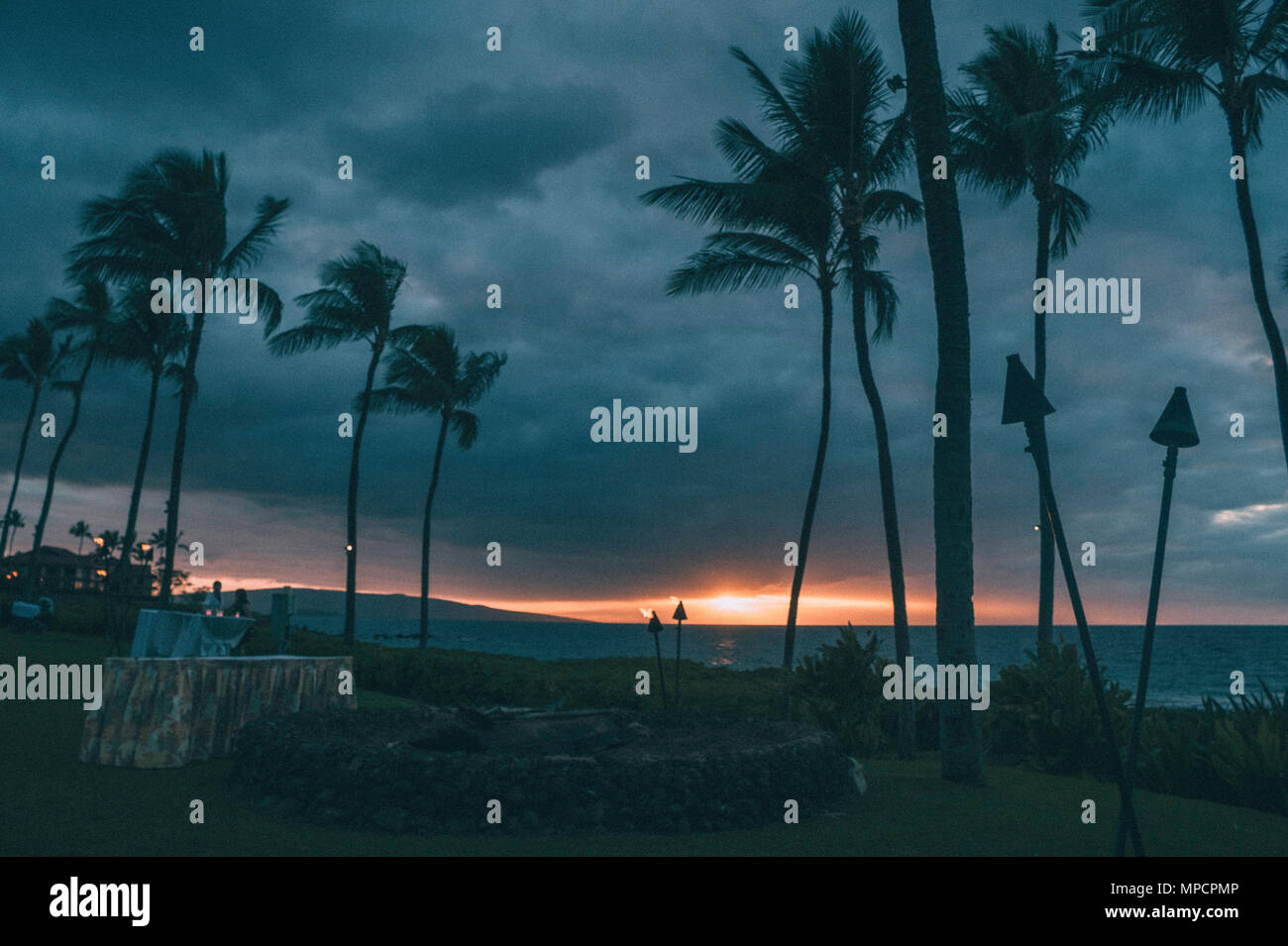 Hawaii beach on Maui during sunset at dusk Stock Photo - Alamy