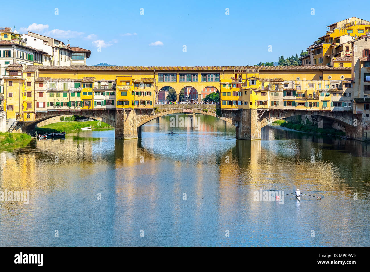 Houses built on the Ponte Vecchio (Old Bridge) over river Arno in ...