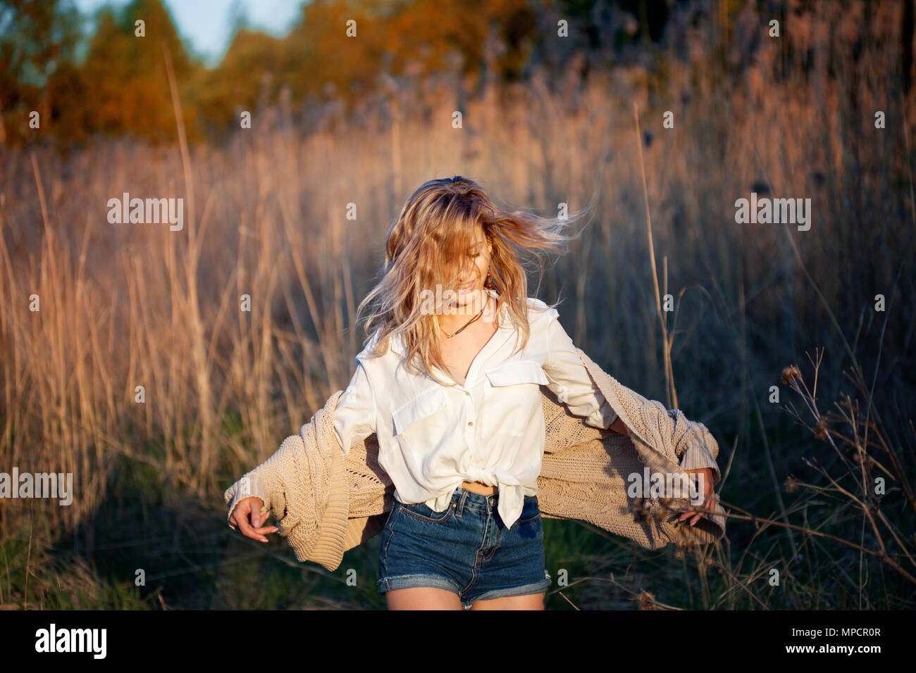 Girl is running out. Young woman in the field, feel freedom and ...